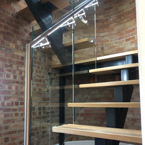 Frameless Side-Fixed Glass Balustrade | UK Staircase - Dio-Met