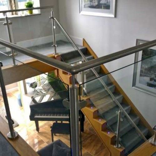 Stainless Steel Glass Balustrade with Handrail | UK - Dio-Met
