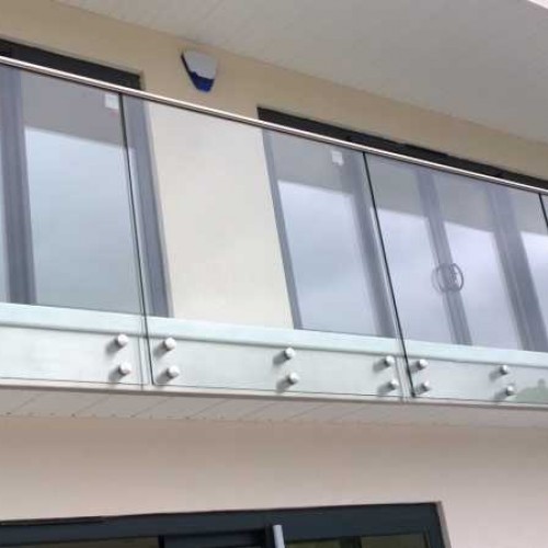 Frameless Side-Fixed Glass Balustrade | UK Staircase - Dio-Met