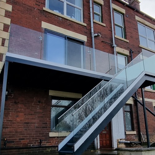 Infinity Frameless Walkout Balcony | UK Custom - Dio-Met
